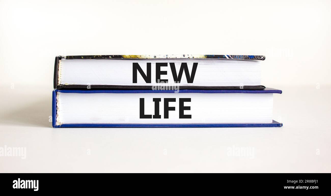 New life symbol. Concept words New life on beautiful books on a ...