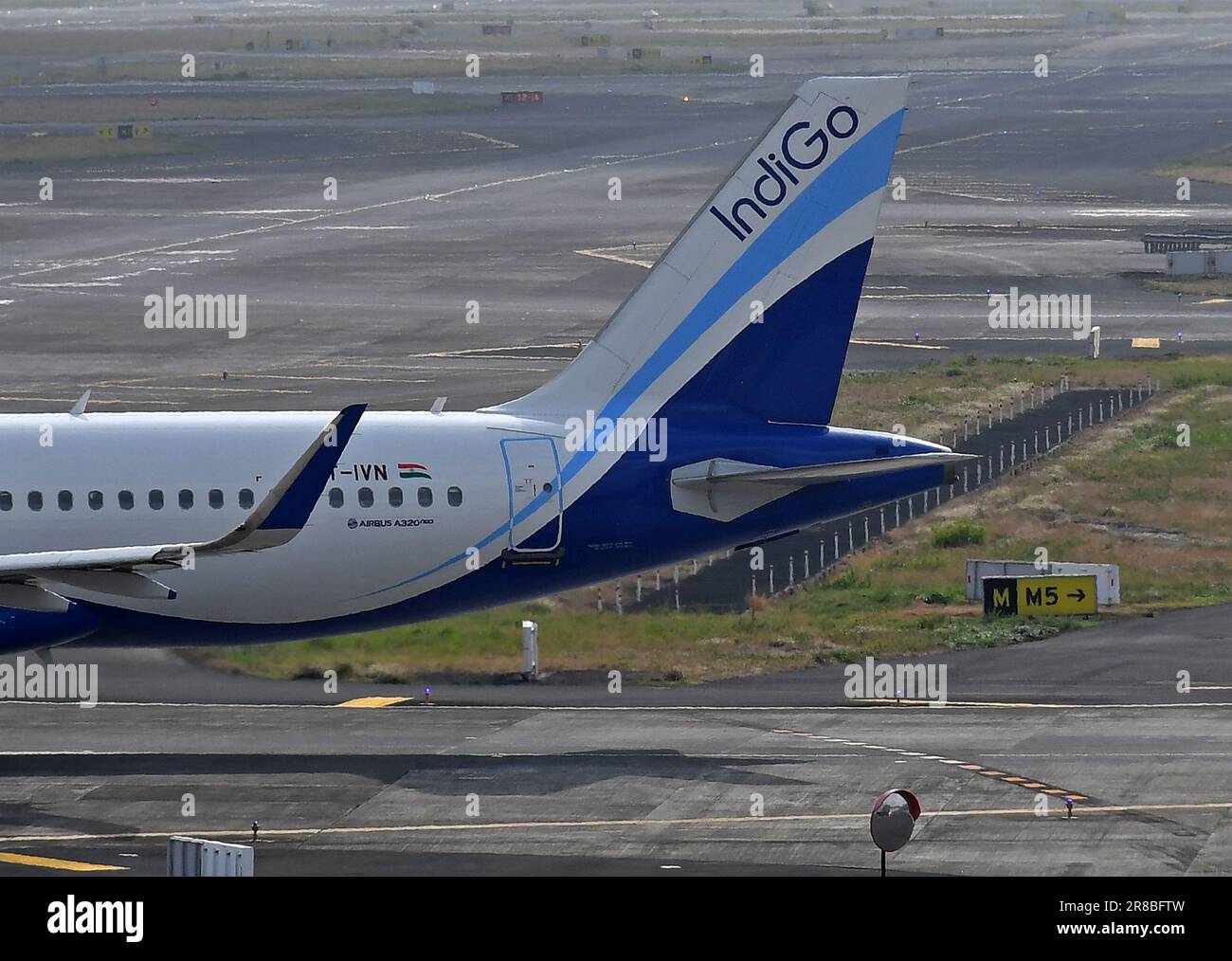 Mumbai, India. 20th June, 2023. Indigo airplane's tail seen at the airport in Mumbai. Indigo ...