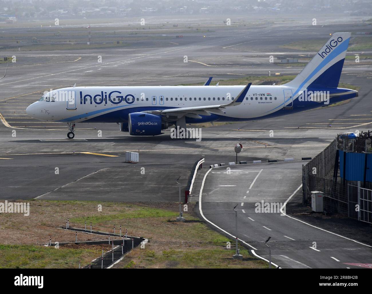 Mumbai, India. 20th June, 2023. Indigo airplane seen near the runway at ...