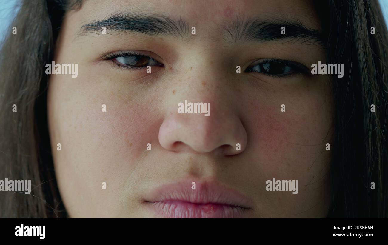 Extreme Close-Up Portrait of a serious Young Asian Woman. Macro Close ...