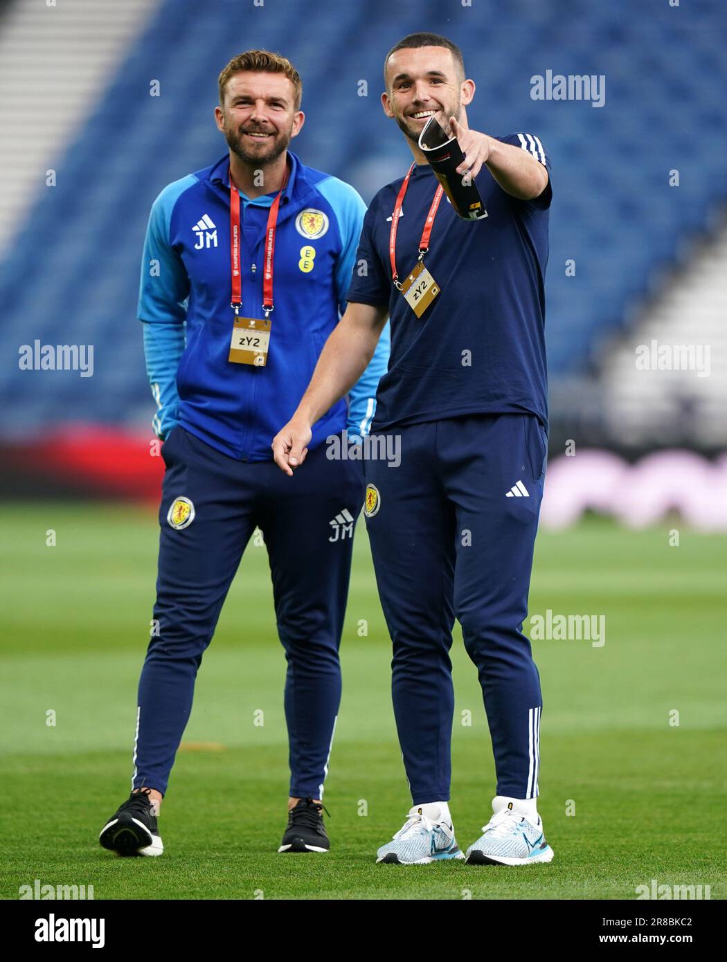 Scotland assistant coach James Morrison (left) and John McGinn walk the ...