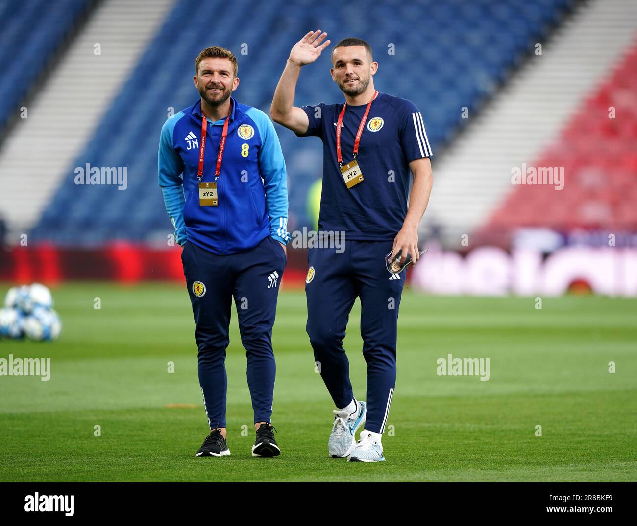 Scotland assistant coach James Morrison (left) and John McGinn walk the ...