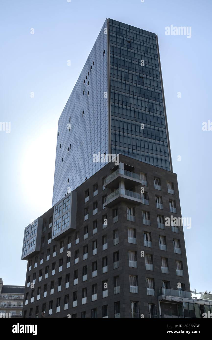 Modern building in its lower part built of brick and in the upper part ...