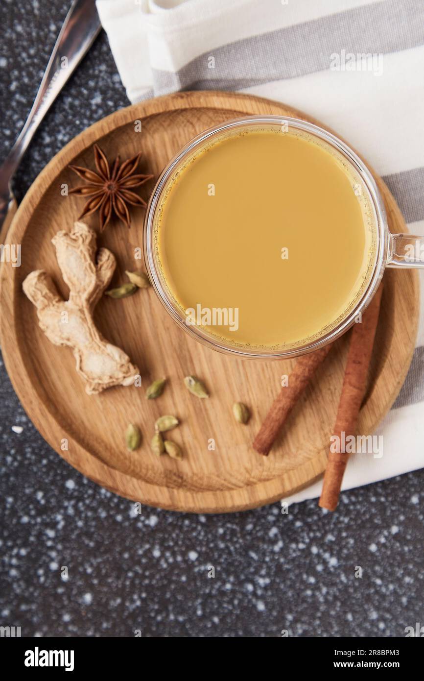 Cup of healthy masala tea top view, traditional drink with spices dried ...