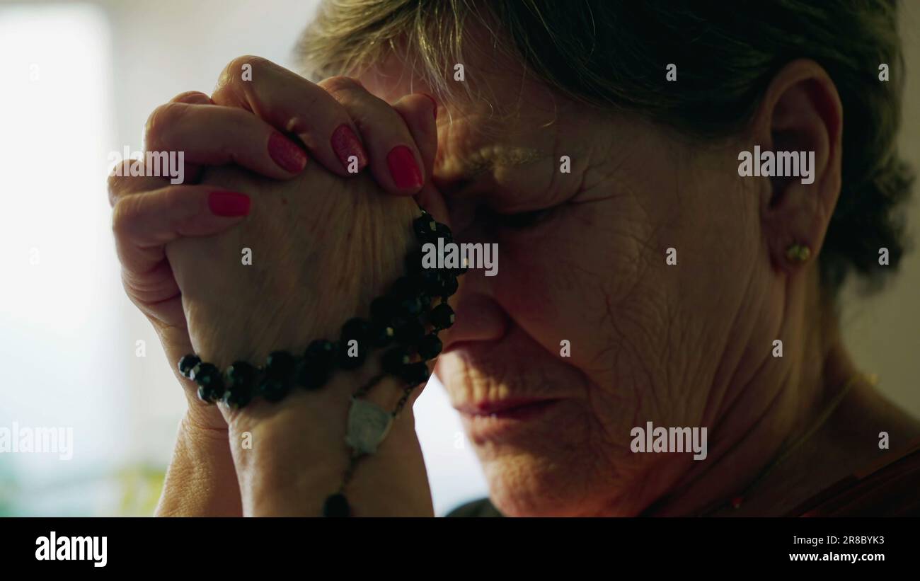 Contemplative Hope, Close-Up of Senior Woman s Faithful Face in Deep ...