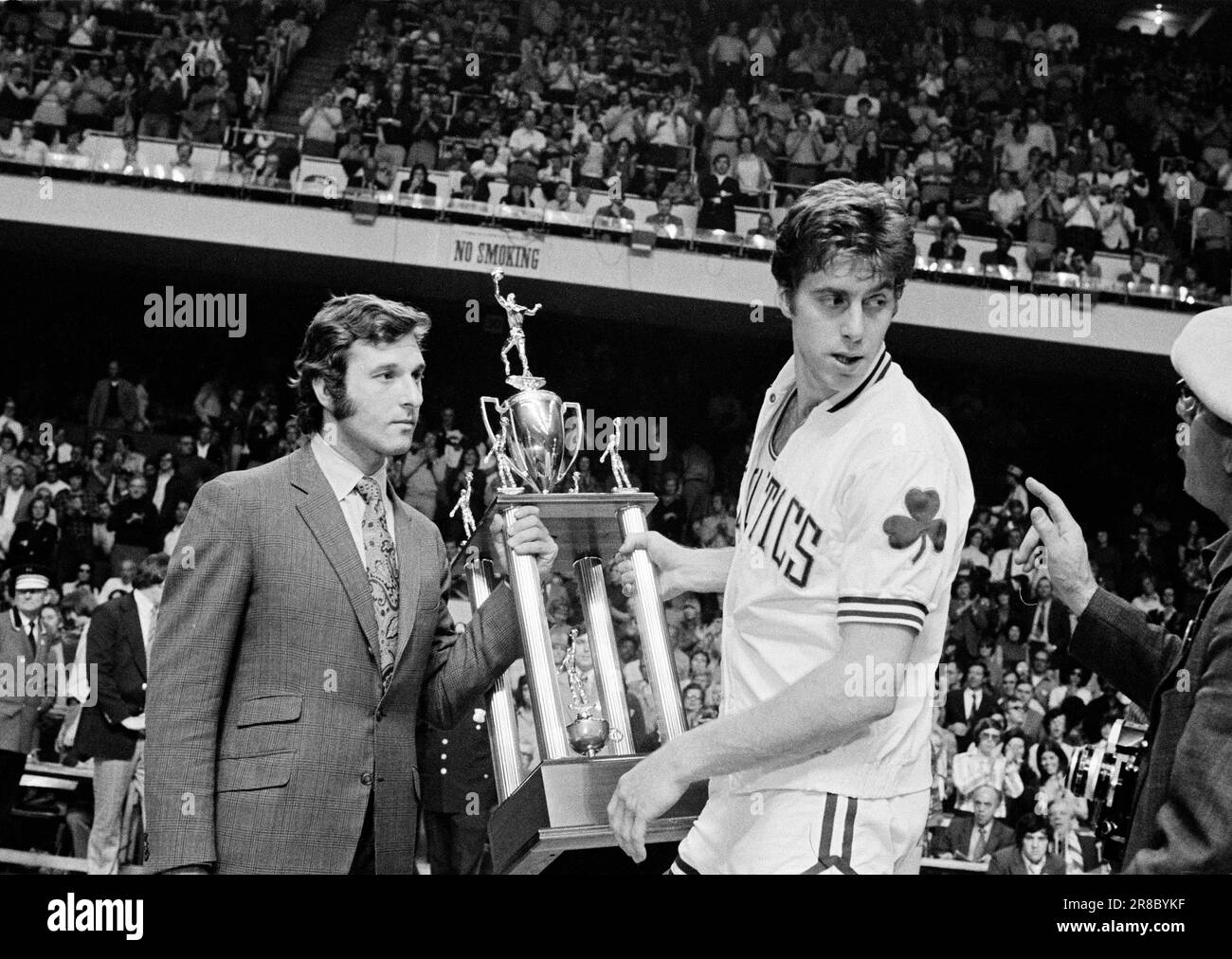 Dave Cowens, right, of the Boston Celtics, is presented the National ...