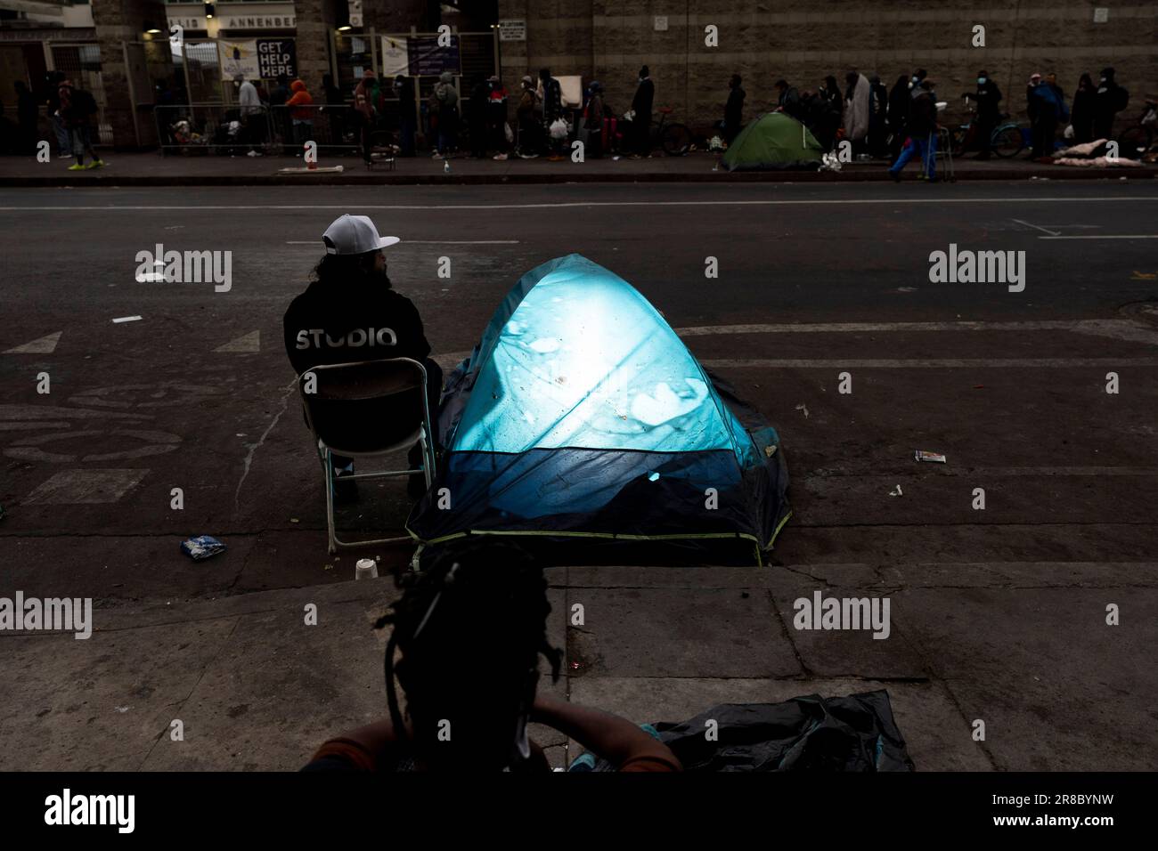 In this photo illuminated by an off-camera flash, Mark Lopez, a 41-year ...