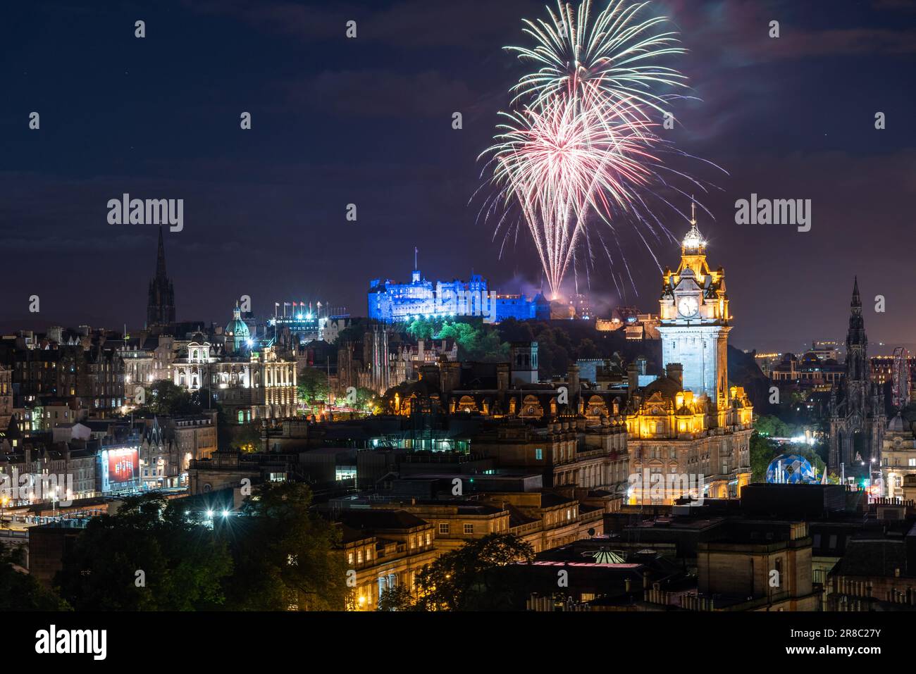 Edinburgh Cityscape with fireworks over The Castle and Balmoral Clock ...