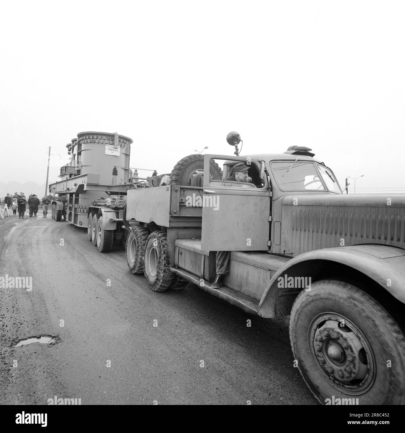 Current 57-3-1960: Giant on city tour Forty wheels rolled in unison ...