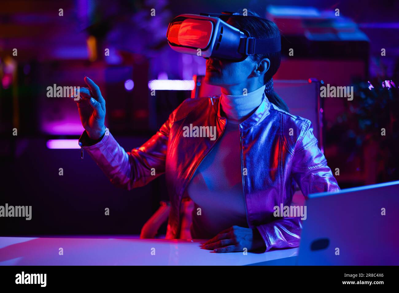 Neon metaverse futuristic concept. stylish business woman in vr headset ...