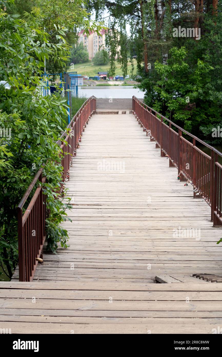 Wood footbridge with railings hi-res stock photography and images - Alamy