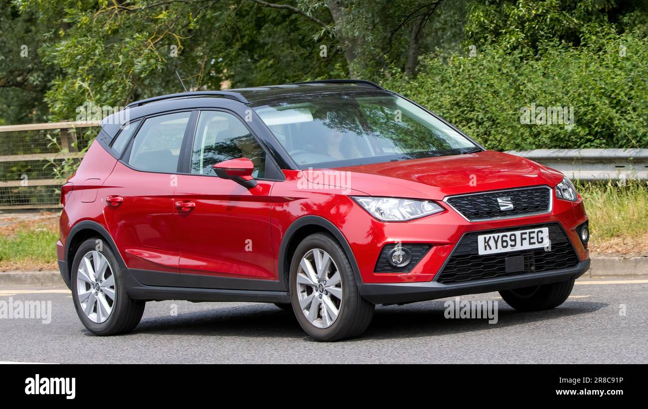 Milton Keynes,UK - June 18th 2023: 2019 red SEAT ARONA car travelling ...