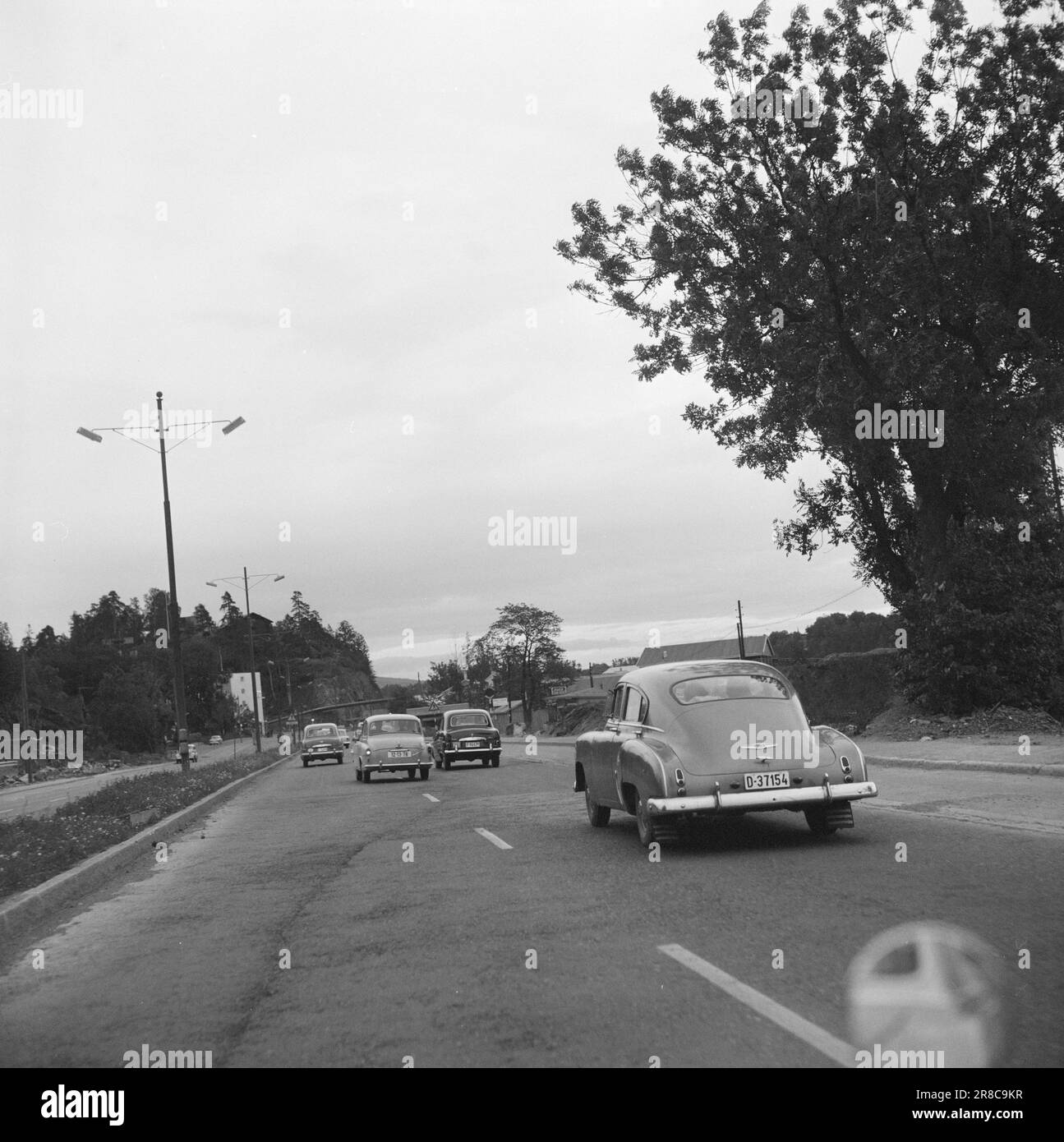 Current 30-5-1960: The speeding death grins behind the wheel. Huge car ...