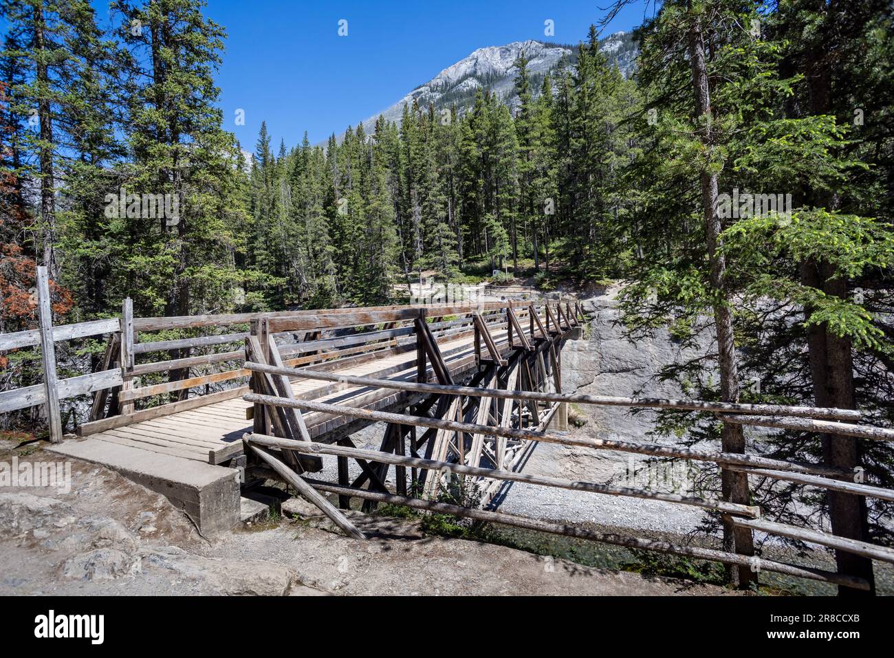 Stewart Canyon wooden Bridge over the Cascade River at Lake Minnewanka ...