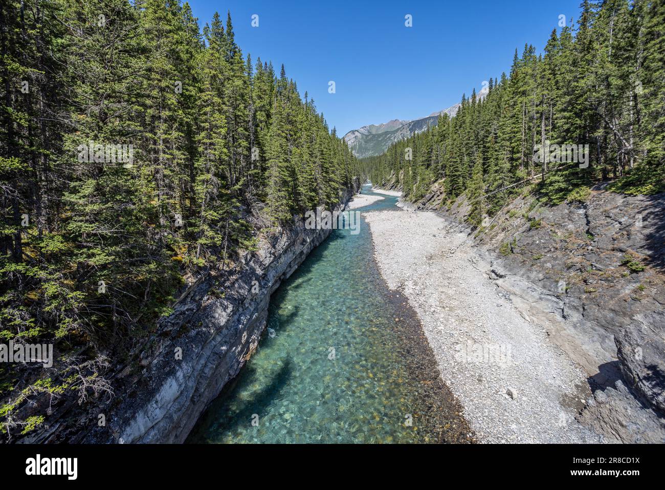 The glacial Cascade River flowing under Stewart Canyon bridge at Lake ...
