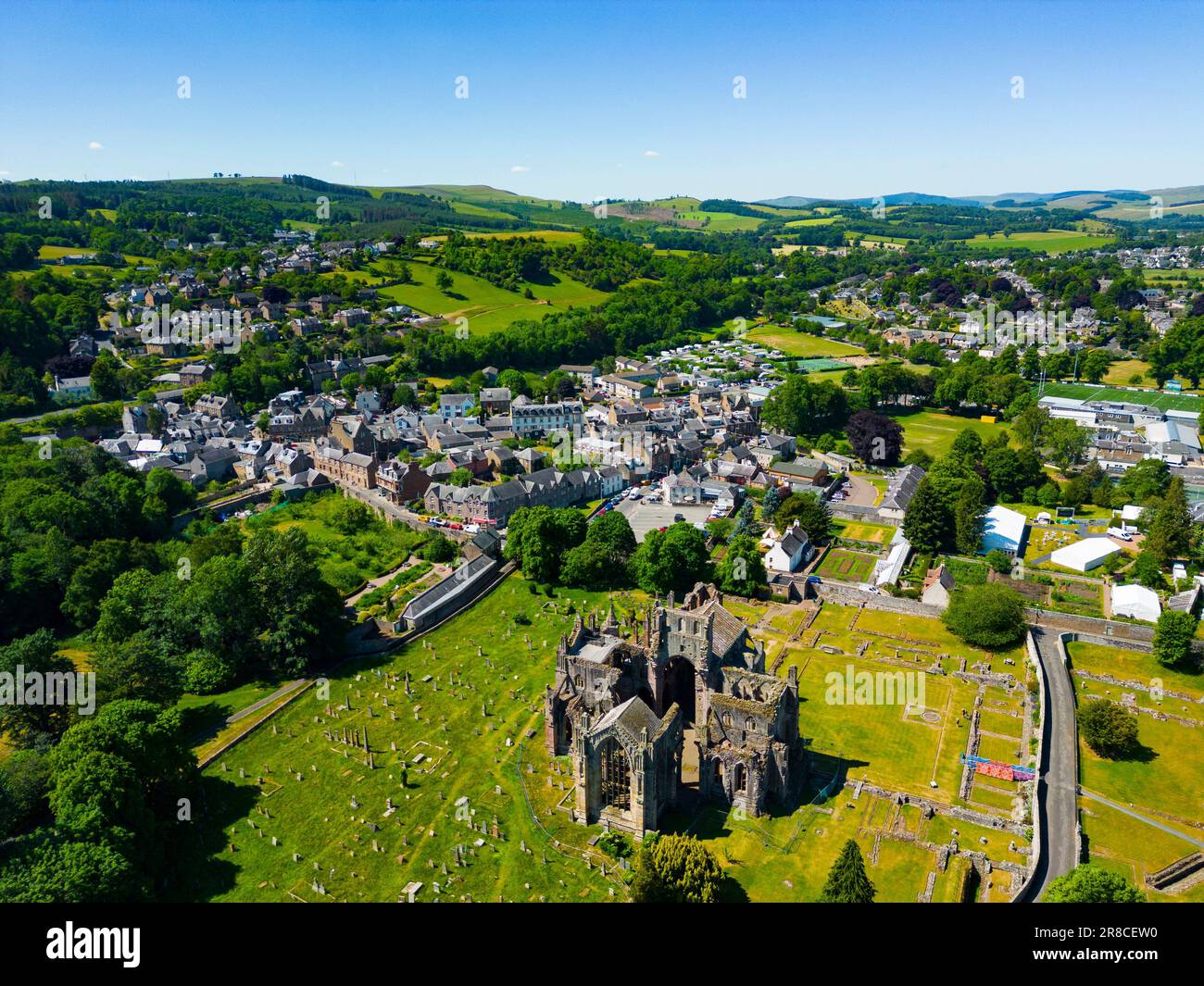 Aerial view from drone of Melrose town and Melrose Abbey in Scottish ...