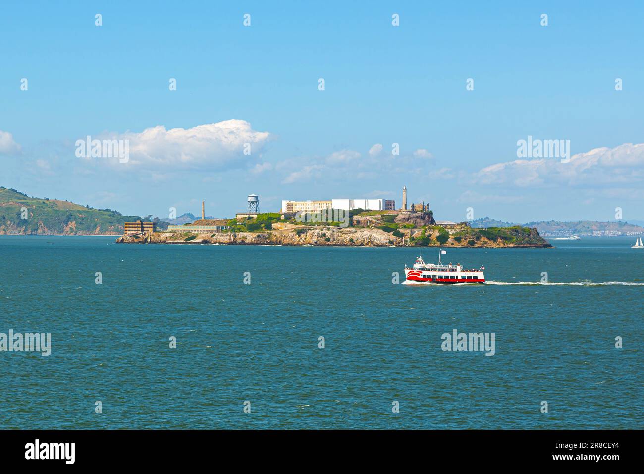 Alcatraz Island in San Francisco, USA. Ferry ship against Alcatraz ...
