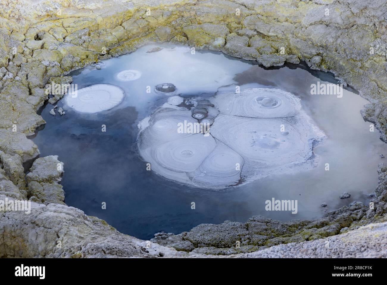 Stunning geothermic field of Sol de Mañana with its steaming geysers ...