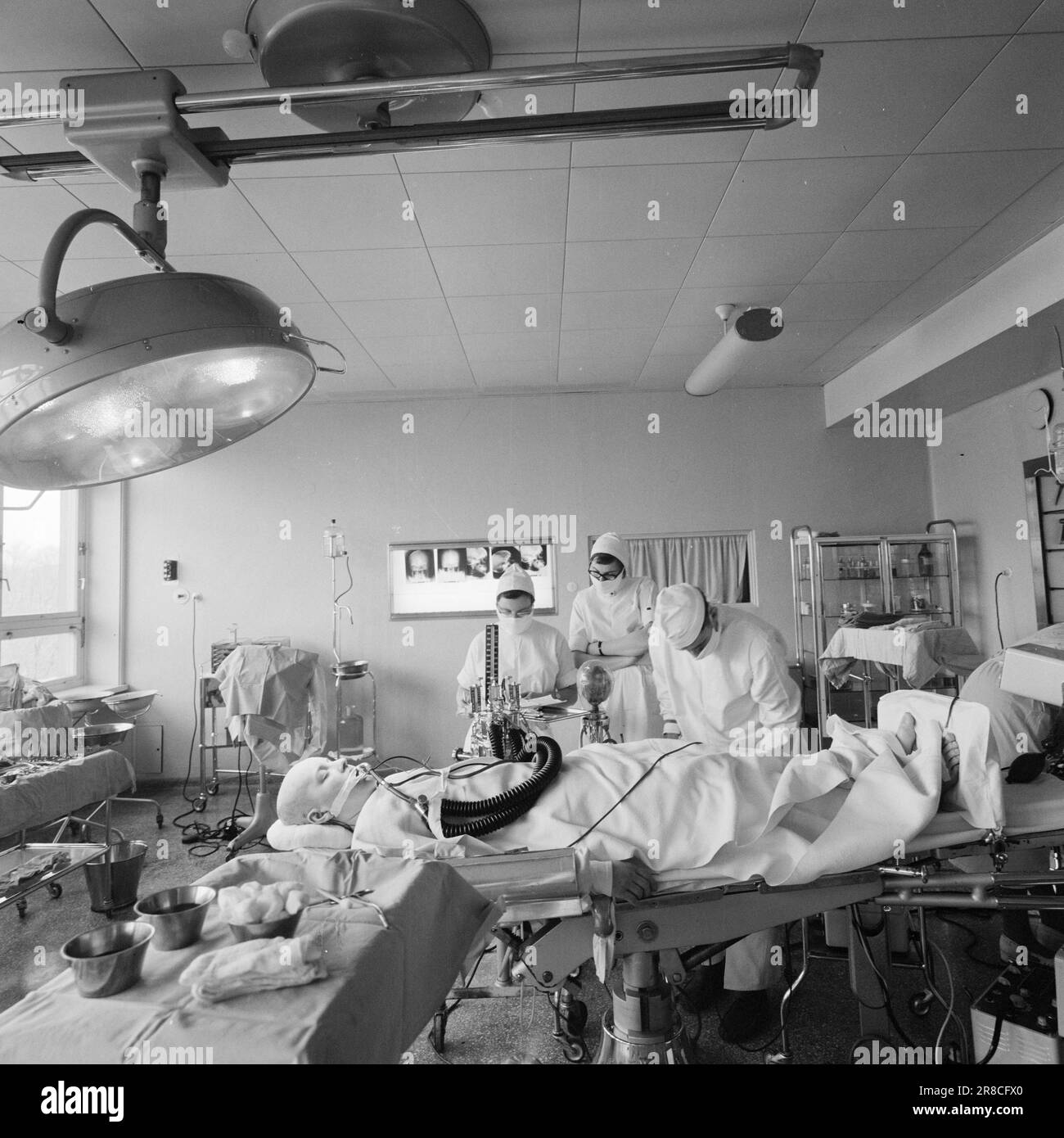 Patient lying on an operating table Black and White Stock Photos ...