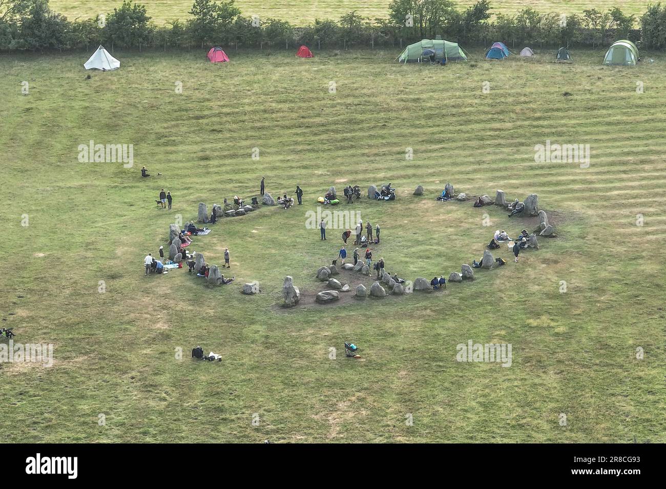 People gather around the stones during the Castlerigg Stone Circle ...
