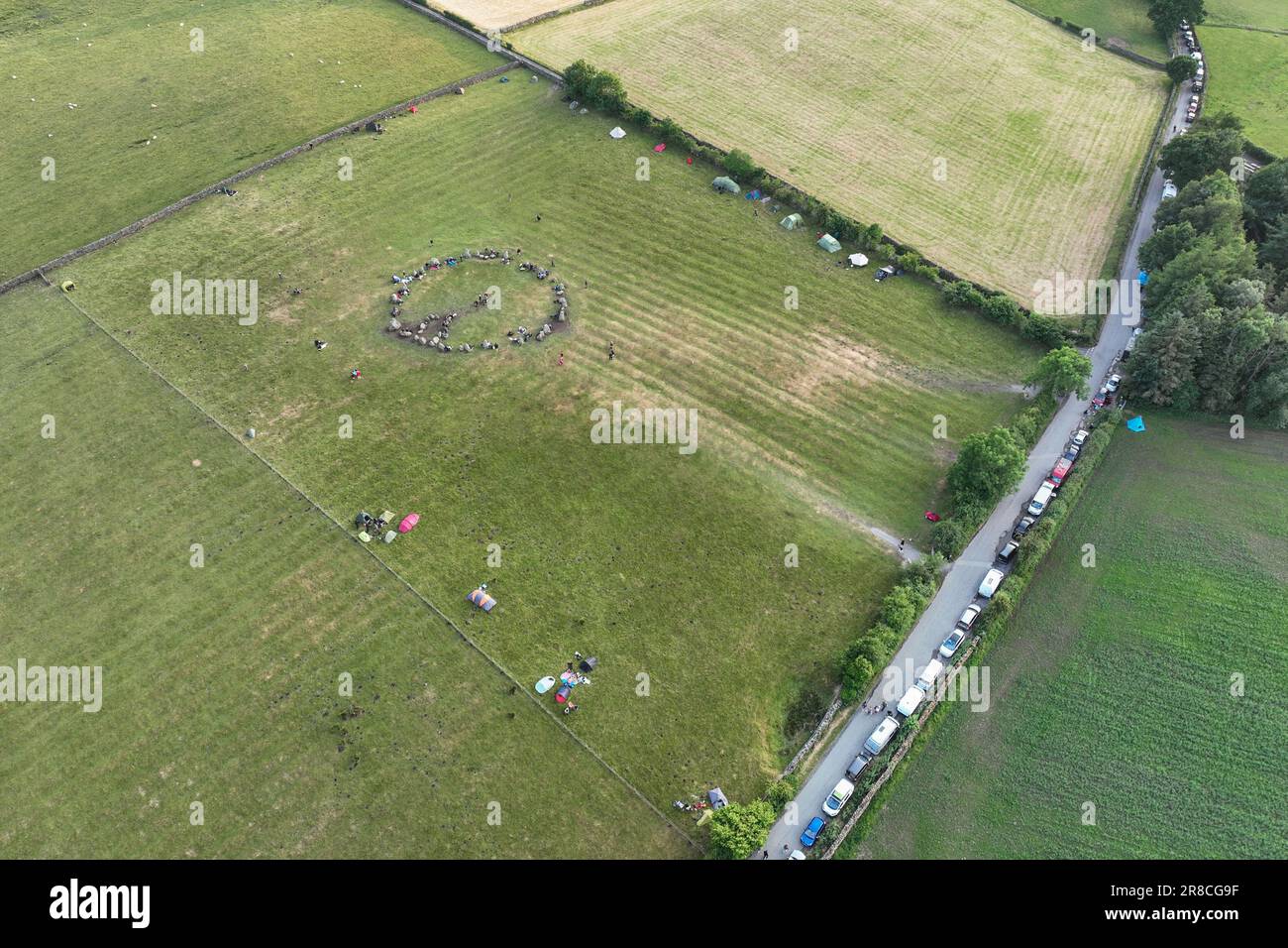 People gather around the stones during the Castlerigg Stone Circle ...