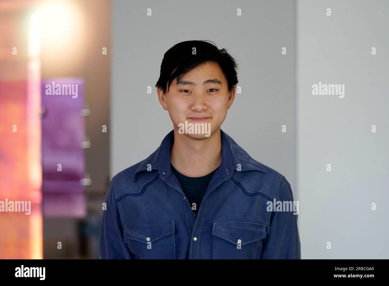 Scale AI founder and CEO Alexandr Wang poses for photos at the company ...