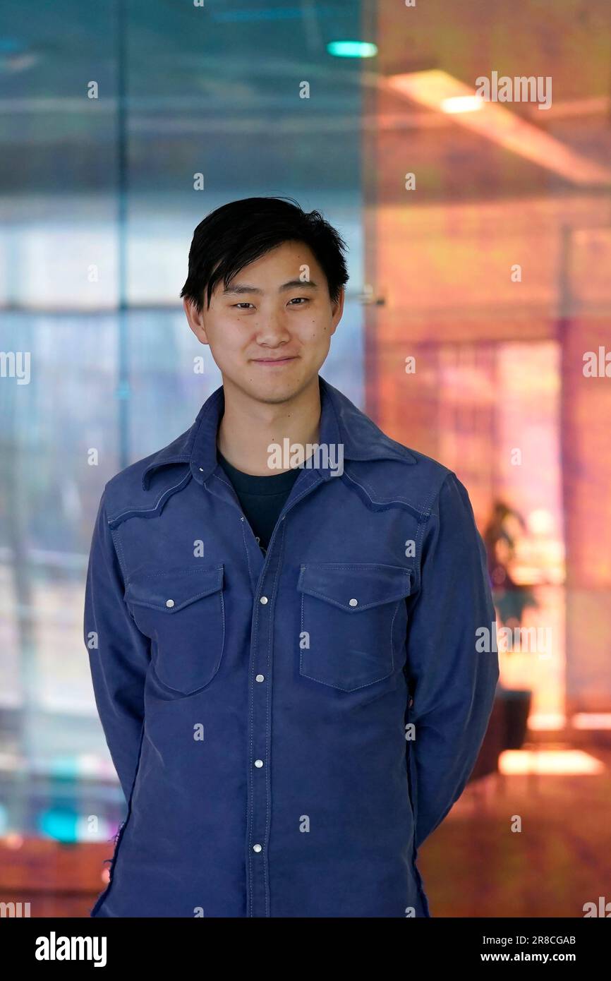 Scale AI founder and CEO Alexandr Wang poses for photos at the company's office in San Francisco ...