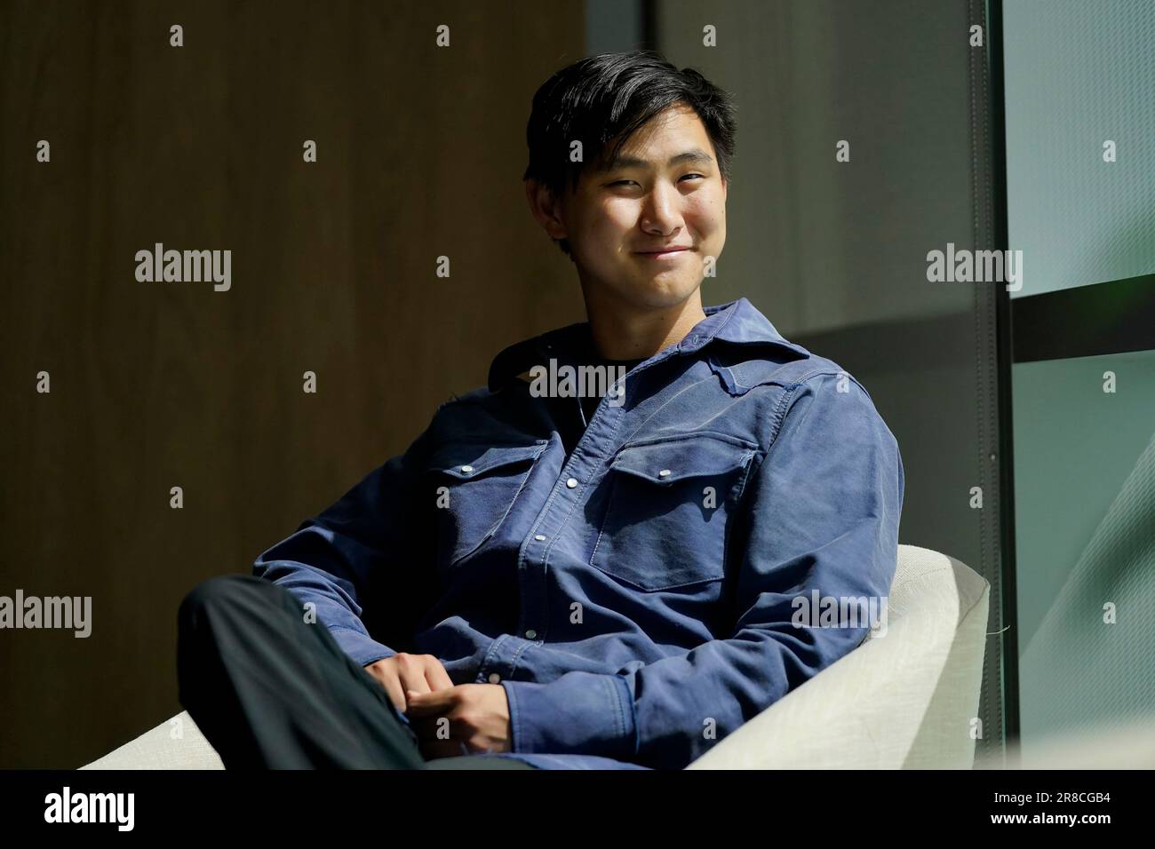 Scale AI founder and CEO Alexandr Wang poses for photos at the company ...