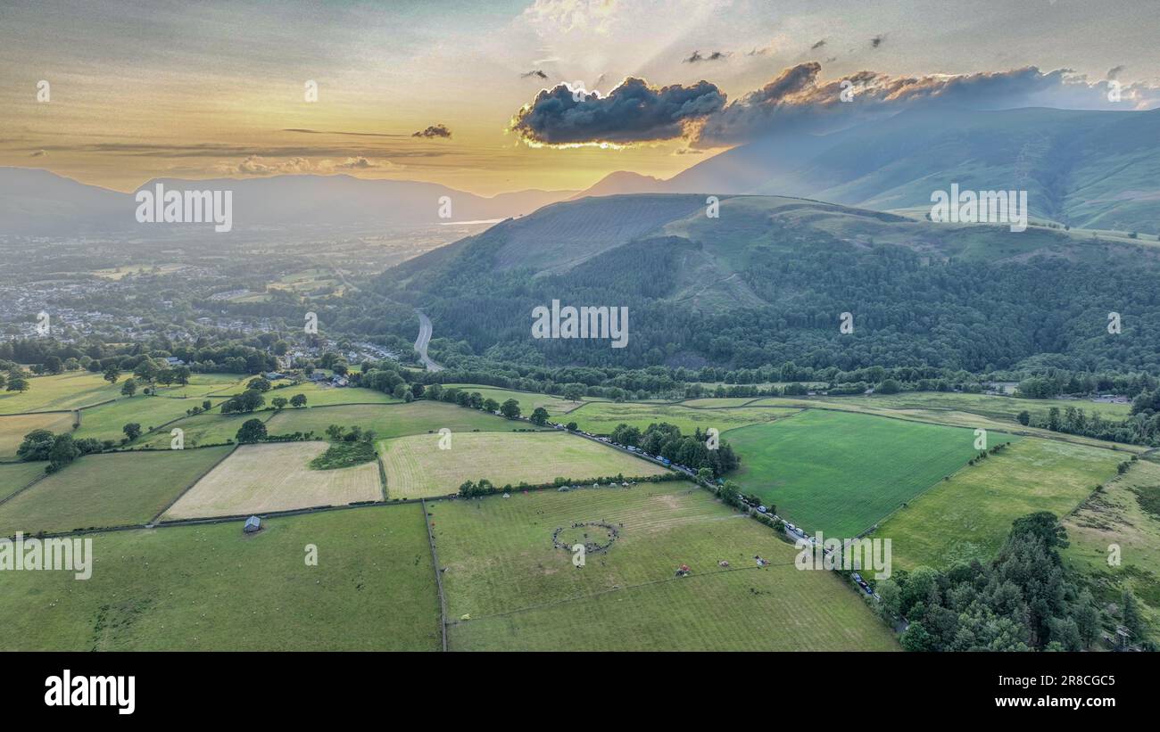 The sun sets over Castlerigg Stone Circle Summer Solstice Celebration ...