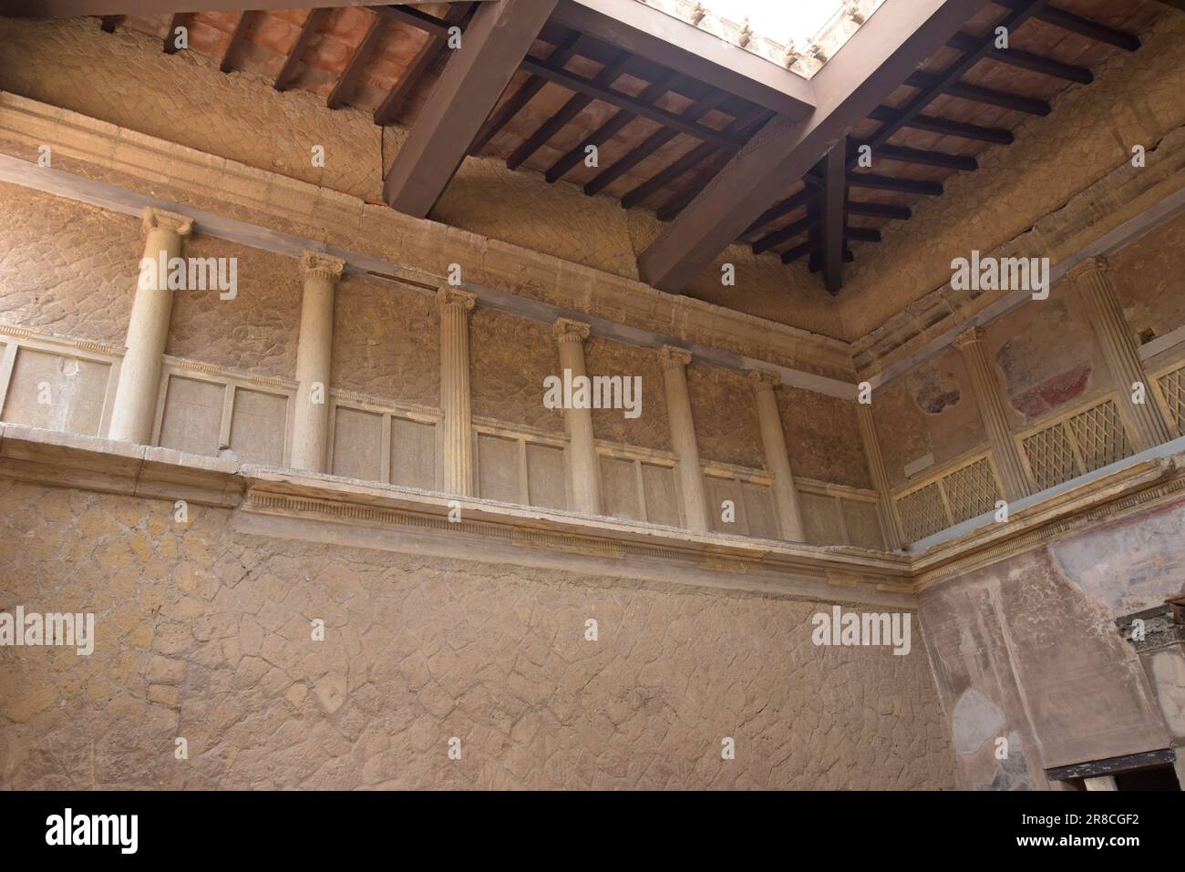 Decorative wall frieze at the Roman town of Herculaneum, buried in the ...
