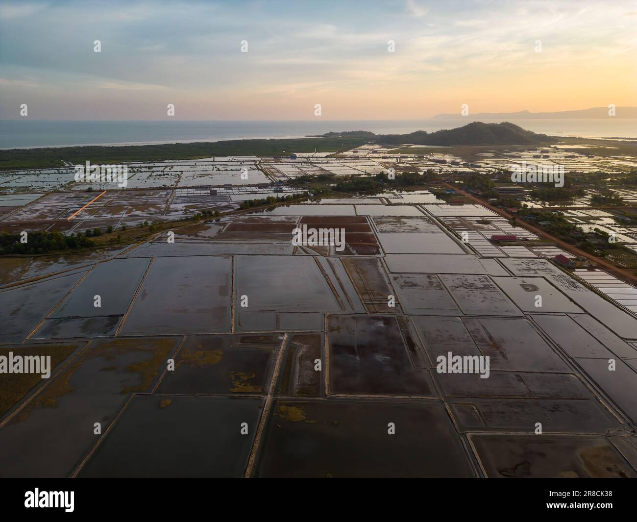 An aerial shot of the Salt Fields in the daylight in Kampot, Cambodia ...