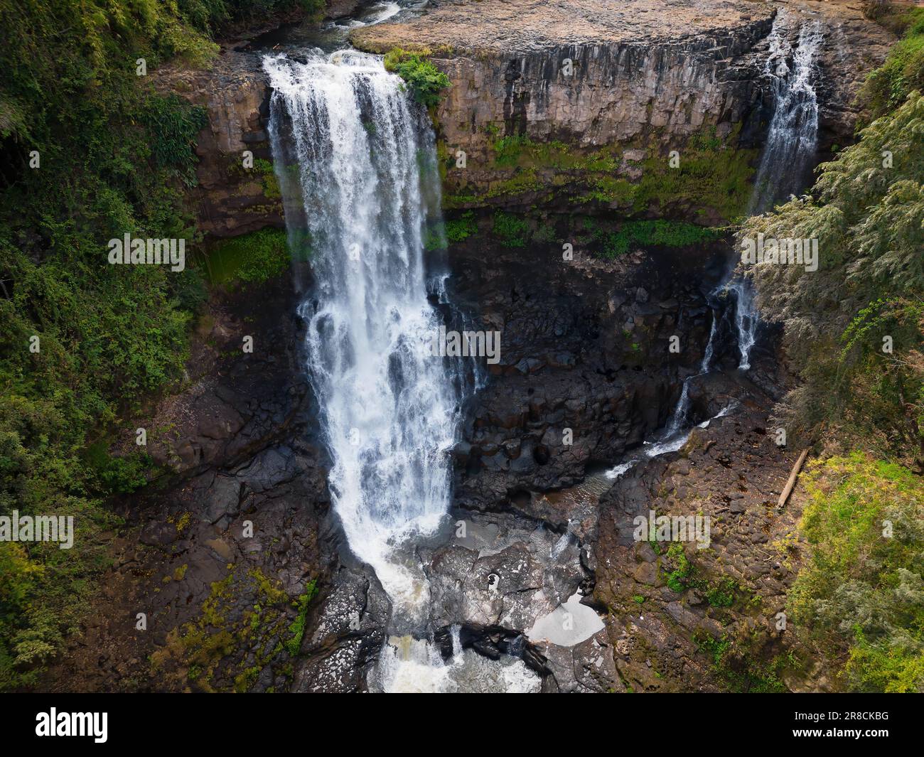 The Bousra waterfall with long exposure in the daylight in Cambodia ...