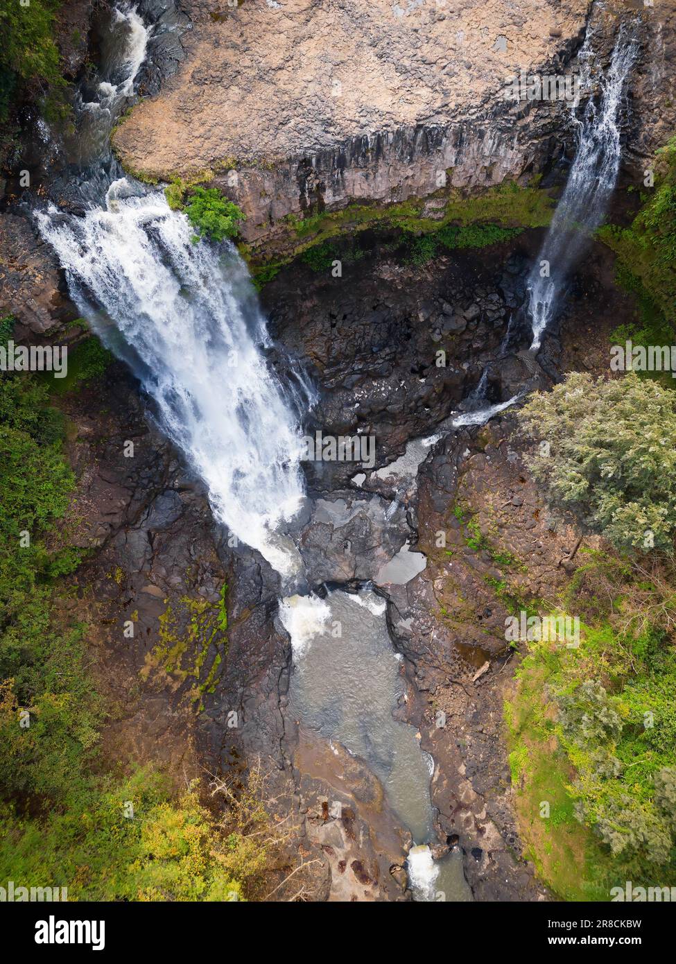 The Bousra waterfall with long exposure in the daylight in Cambodia ...