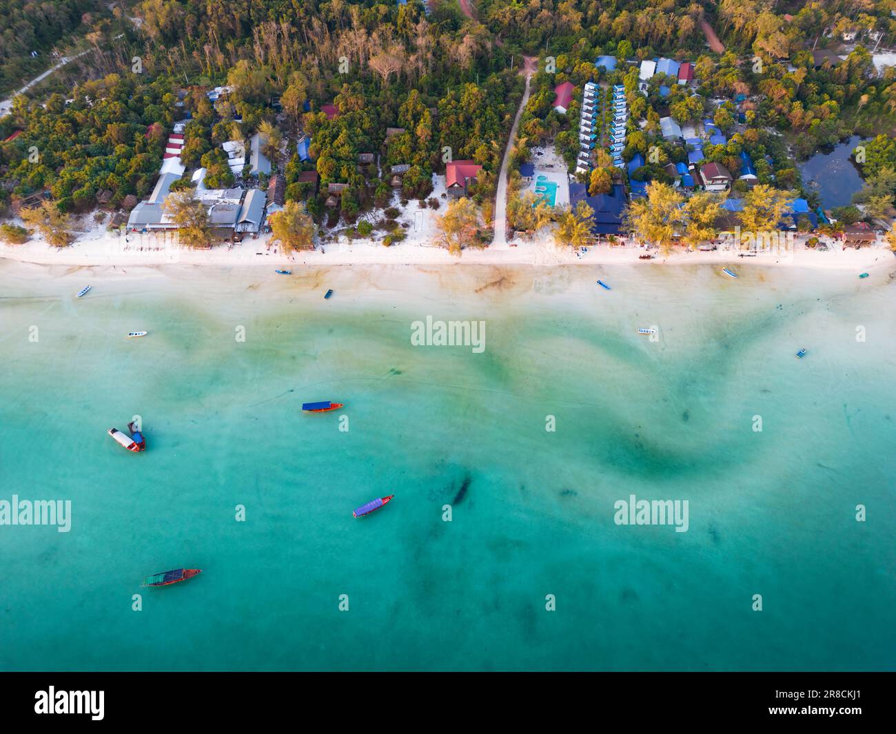 An aerial shot of the Saracen Bay surrounded by greenery in Koh Rong ...