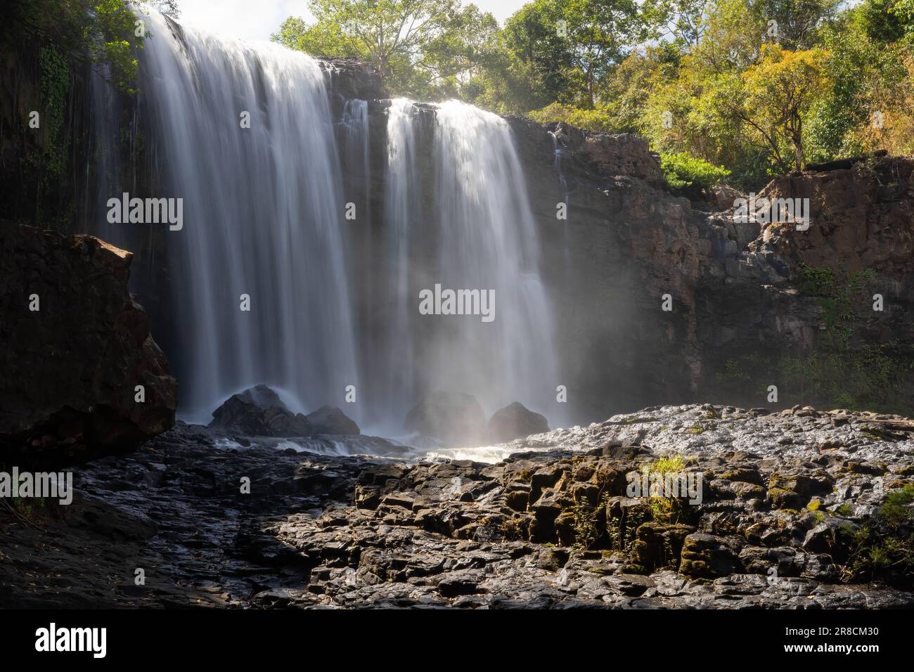 The Bousra waterfall with long exposure in the daylight in Cambodia ...