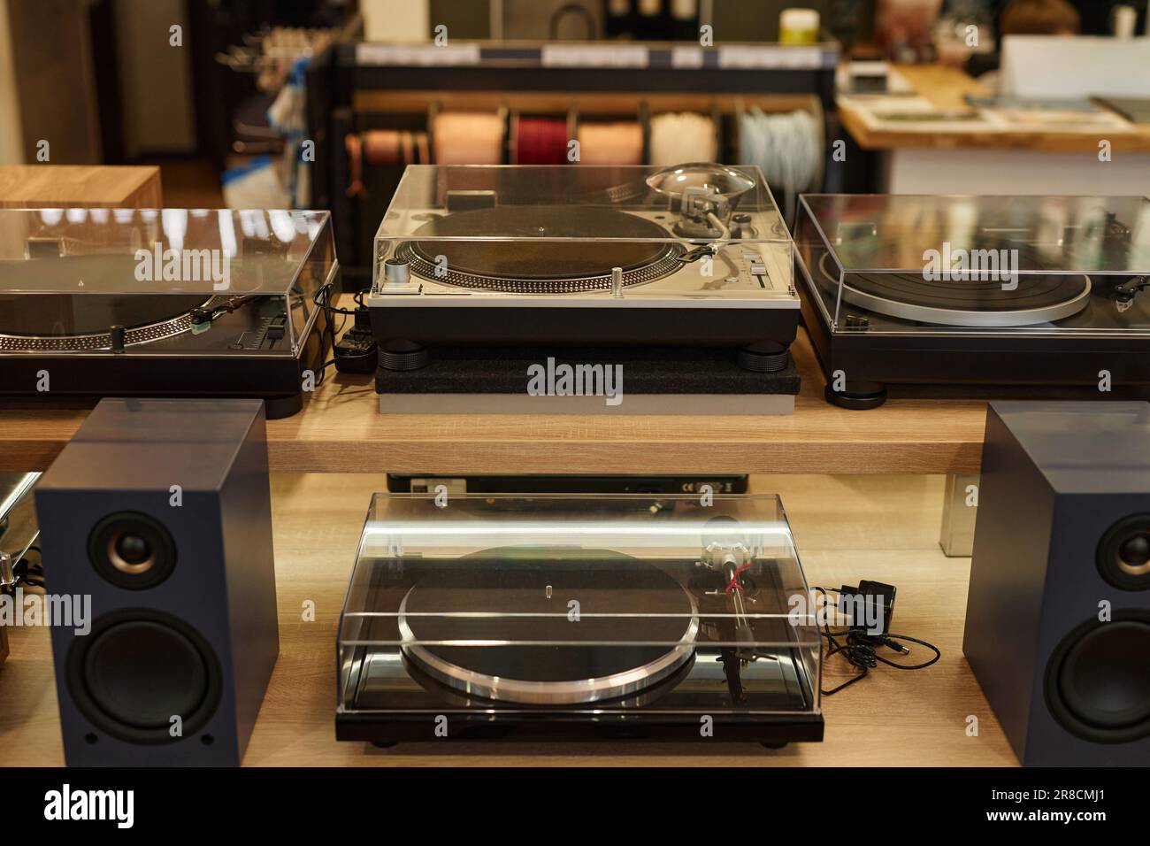 Background image of brand new vinyl record players on display in music ...