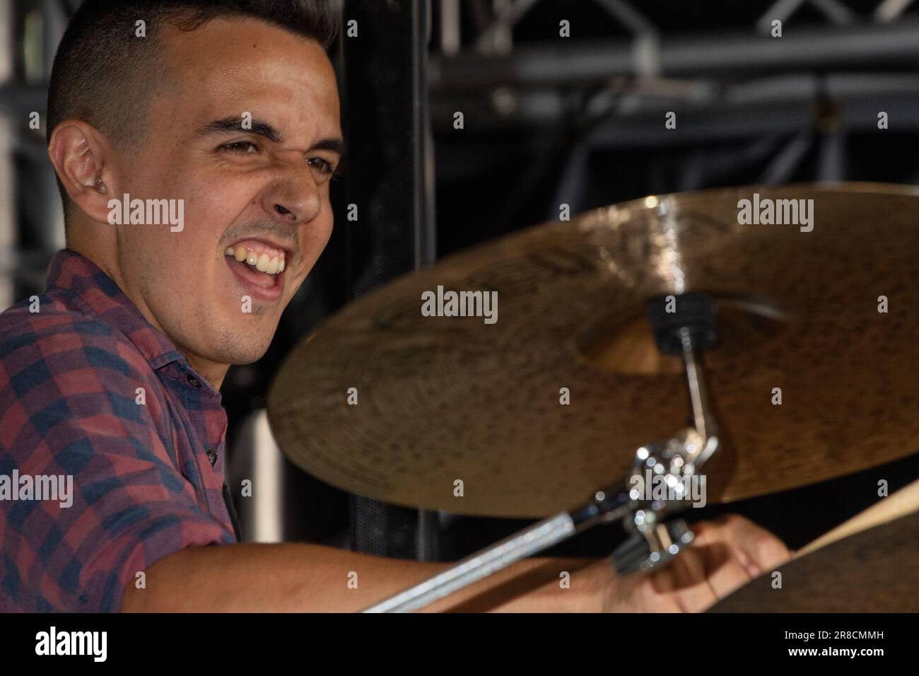 Playing guitar with teeth hi-res stock photography and images - Alamy