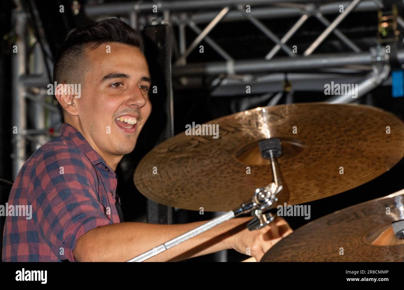 Playing guitar with teeth hi-res stock photography and images - Alamy