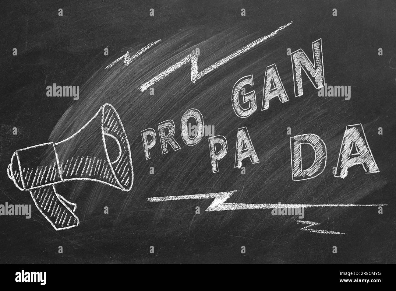 Propaganda and fake news concept. Illustration on blackboard. A ...