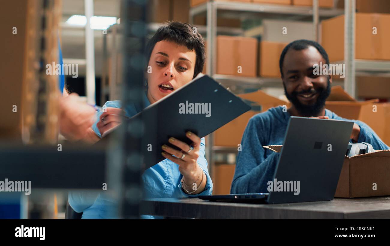 Team startup owners packing merchandise hi-res stock photography and ...