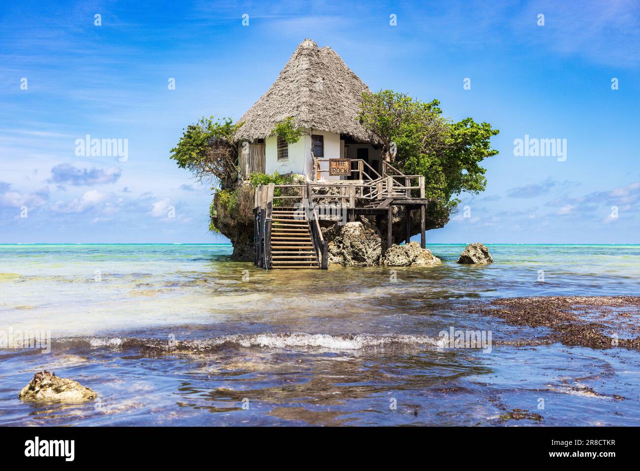A beautiful tropical beach with white sand and clear blue water on the ...