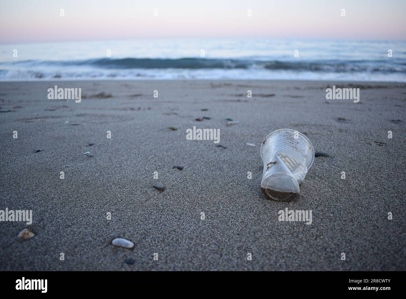 Plastic waste dumped on the beach Stock Photo - Alamy