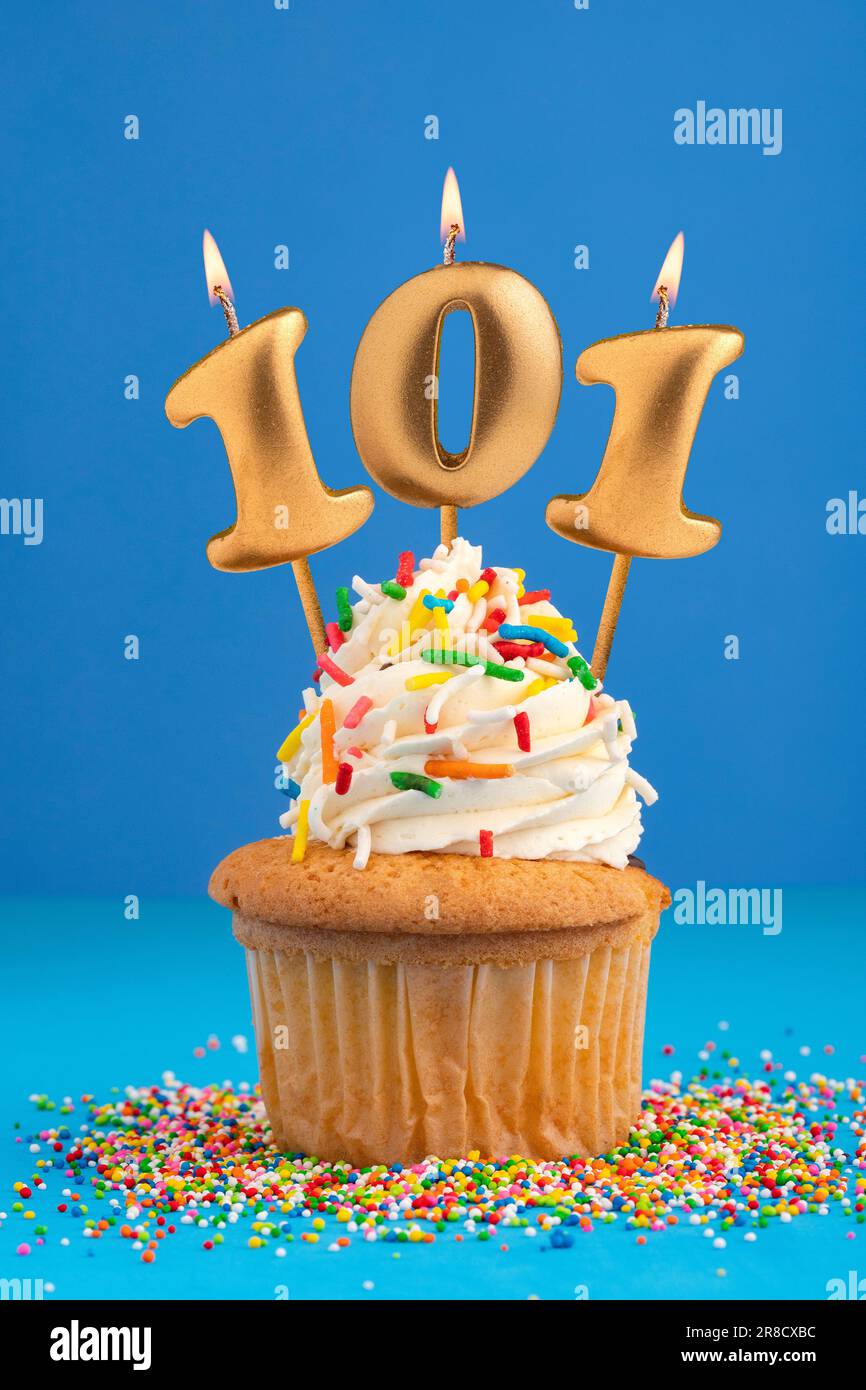 Candle number 101 - Cake birthday in blue background Stock Photo - Alamy