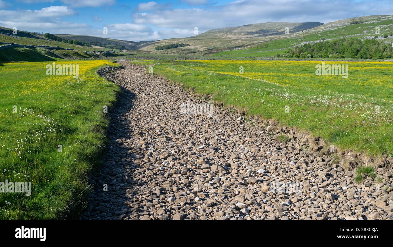 Dried up riverbed in Kingsdale, a limestone valley on the western edge ...