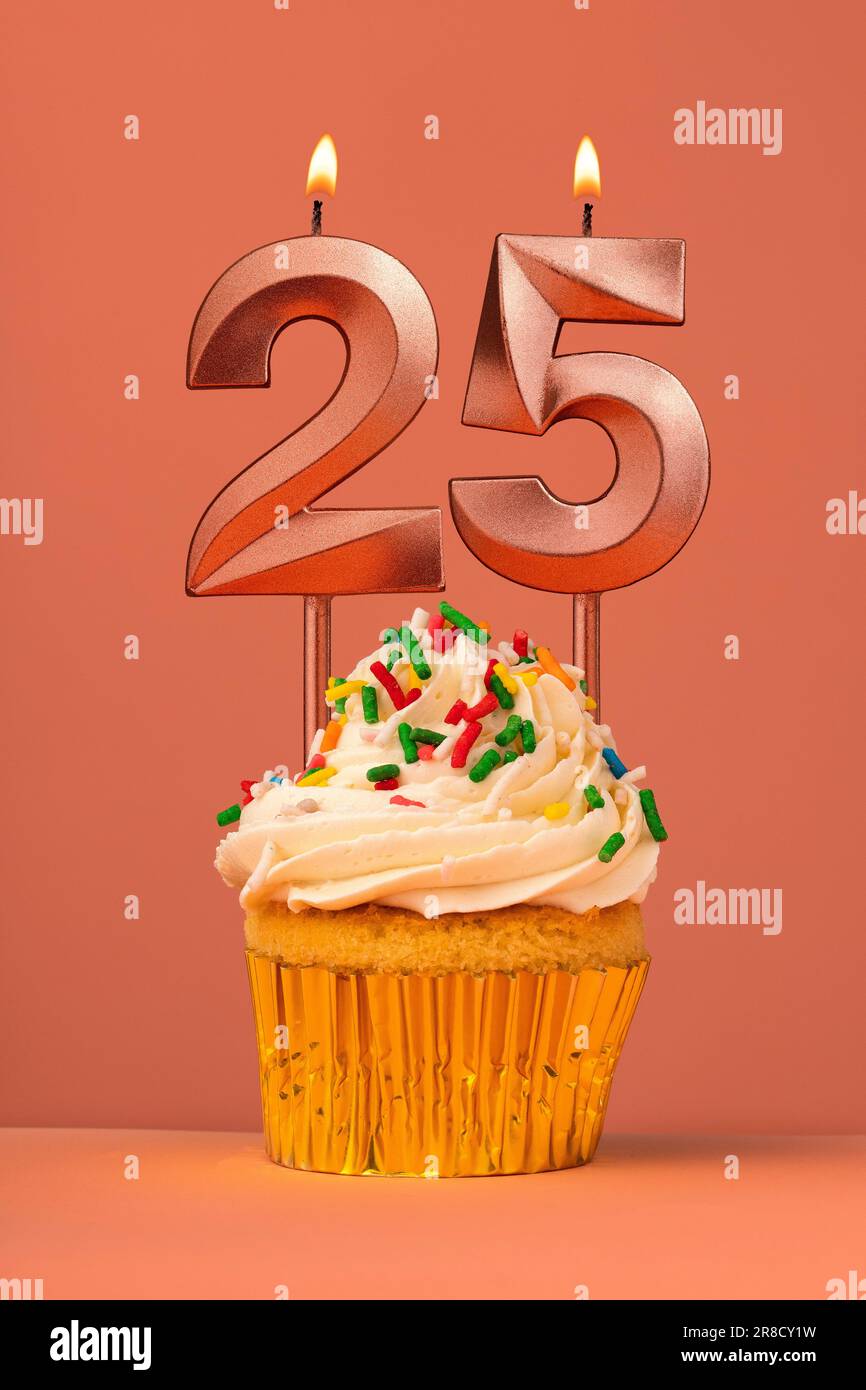 Birthday cake with candle number 25 - Coral fusion background Stock ...
