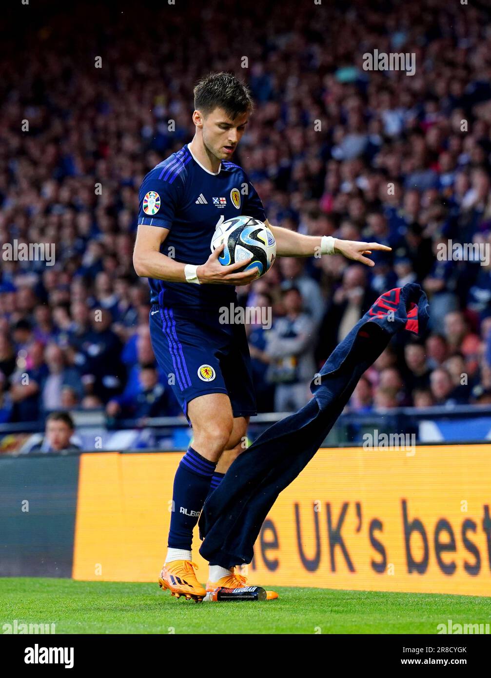 Scotland's Kieran Tierney dries the ball with a towel during the UEFA ...