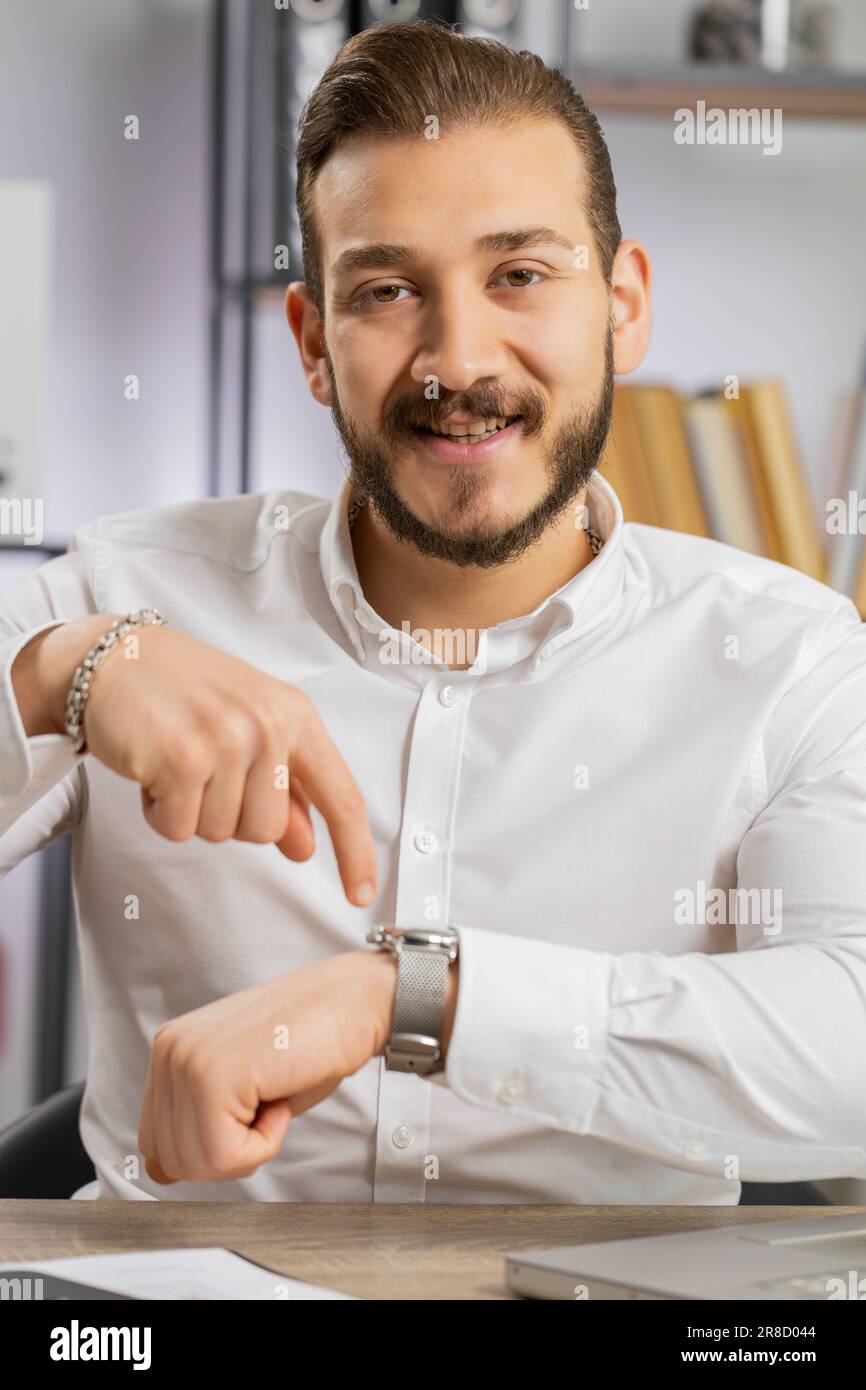 Waiting man looking watch showing hi-res stock photography and images ...