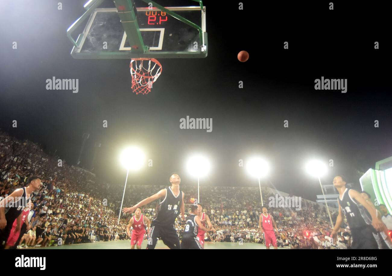 QIANDONGNAN, CHINA - JUNE 20, 2023 - Farmers compete in a village BA ...