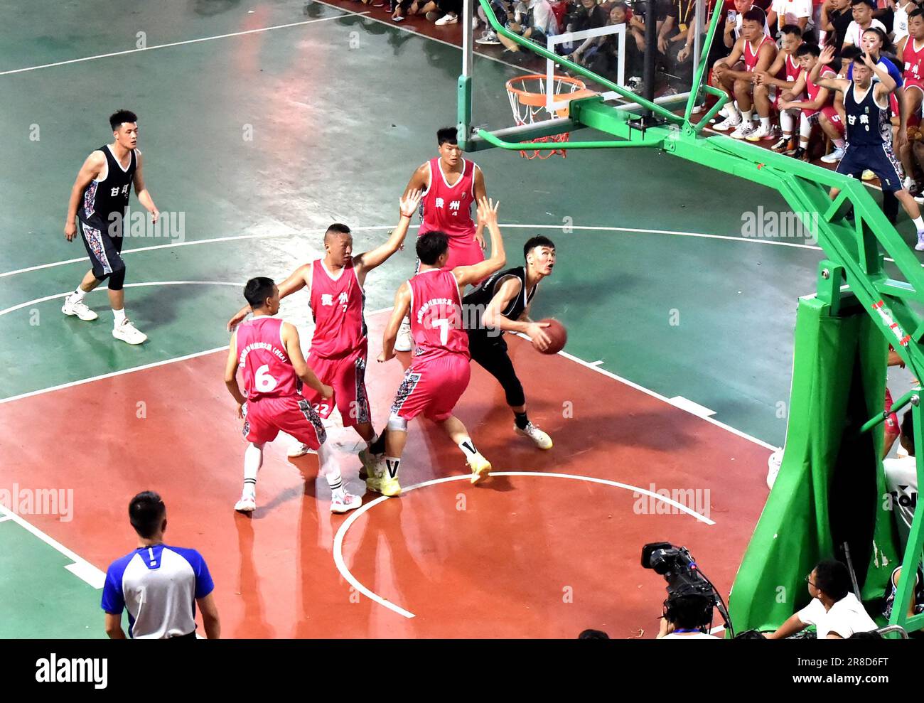 QIANDONGNAN, CHINA - JUNE 20, 2023 - Farmers compete in a village BA ...