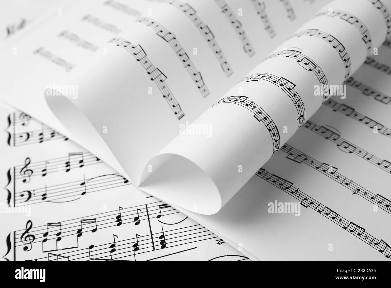 Sheets of paper with music notes as background, closeup Stock Photo - Alamy